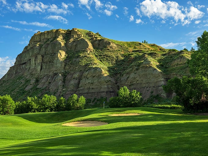 At Bully Pulpit Golf Course, that dramatic backdrop isn't just scenery&mdash;it's a silent judge of your swing. Roosevelt would approve of this sporting challenge.