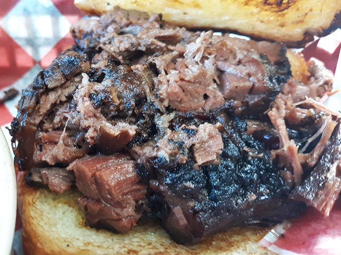 Burnt ends – barbecue's greatest magic trick. Somehow the toughest part of the brisket becomes these caramelized cubes of meat candy.