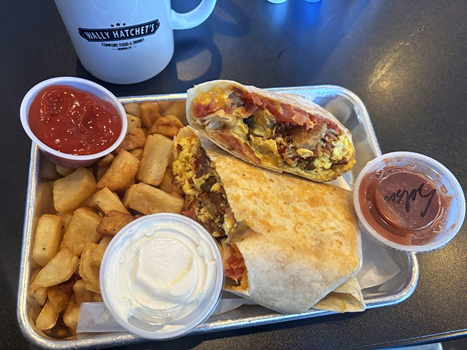 The breakfast burrito arrives loaded with eggs, meat, and cheese, proving portable breakfast can be just as satisfying as plated.