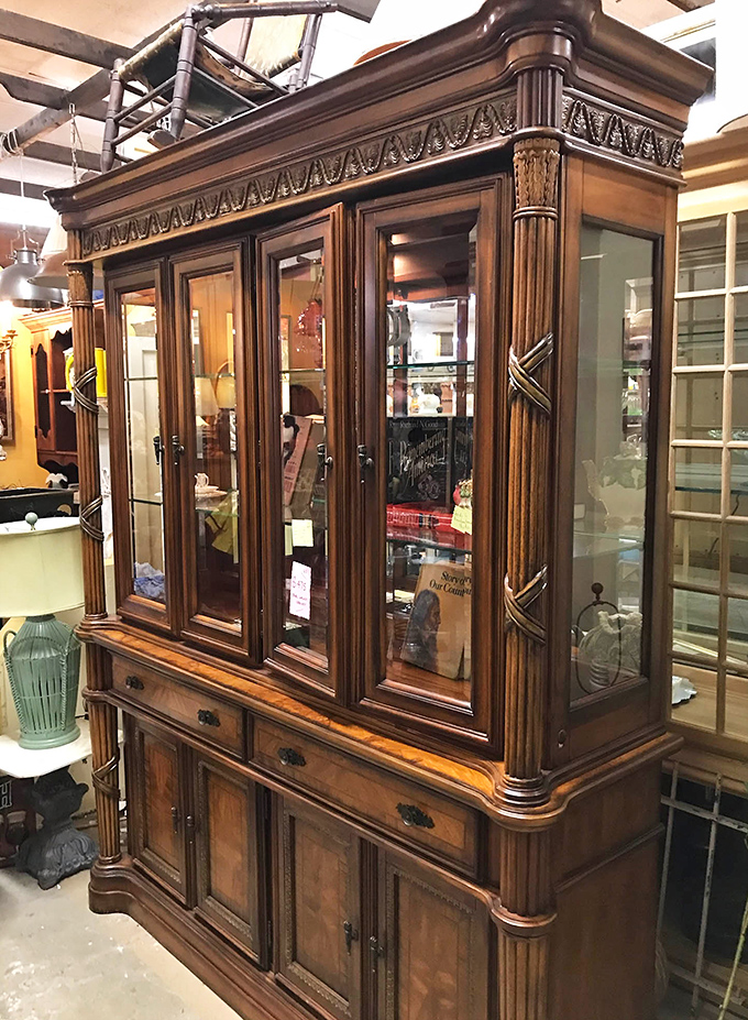 This isn't just a cabinet; it's architectural majesty in wood form, with the kind of craftsmanship that makes modern furniture weep with inadequacy.