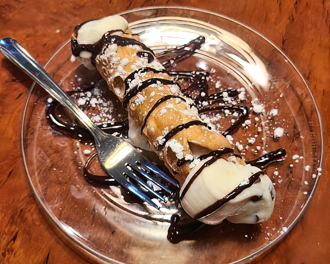 The cannoli&mdash;Sicily's gift to the dessert world&mdash;with that perfect shell crunch giving way to sweet, creamy filling. Resistance is futile.