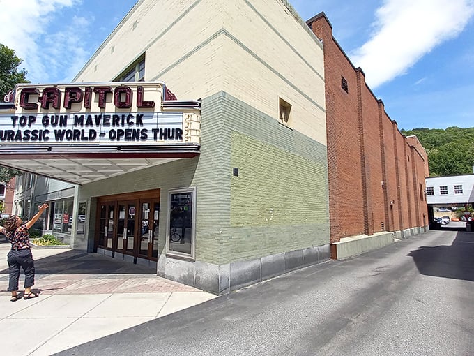 The Capitol Theatre's vintage marquee promises entertainment the old-fashioned way – no algorithms here, just movies and community gathering.