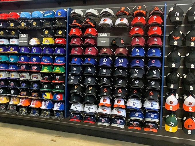 Baseball cap heaven where even the most sports-apathetic shopper suddenly develops strong opinions about team logos and brim curvature.