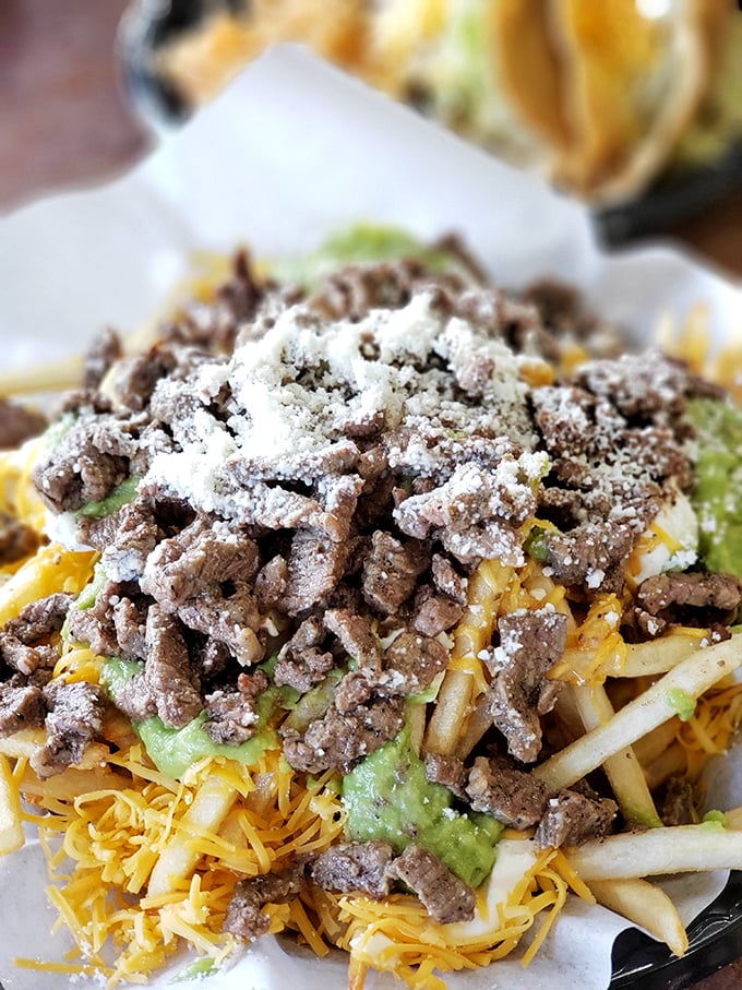 Carne asada fries: where the potato reaches its highest calling. A mountain of flavor that makes regular fries seem like they're not even trying.