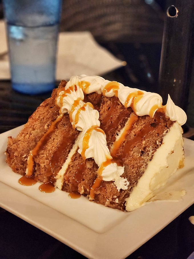 A slice of heaven on a plate&mdash;layers of moist carrot cake embraced by cream cheese frosting and drizzled with caramel that would make angels weep.