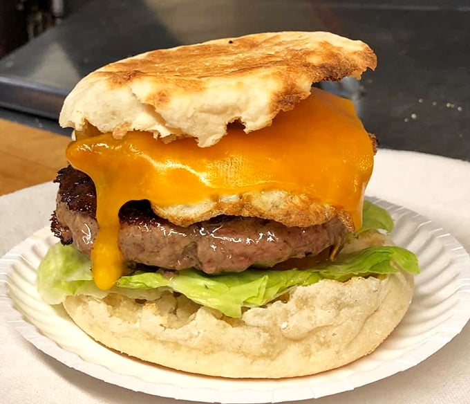 This isn't just a burger &ndash; it's a masterclass in diner perfection. That melted cheese cascade is what food dreams are made of.