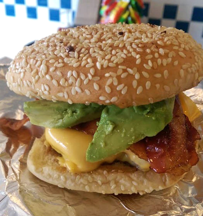 Who invited this burger to the hot dog party? With avocado and cheese, it's the California cousin who shows up uninvited but everyone loves anyway.