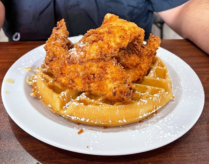 Crispy fried chicken perched atop a golden waffle &ndash; a sweet and savory romance that puts most Hollywood love stories to shame.
