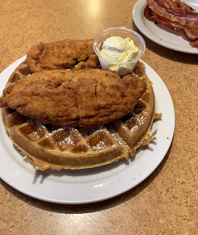 Chicken and waffles: the breakfast-lunch alliance that proves some of history's greatest partnerships involve maple syrup.