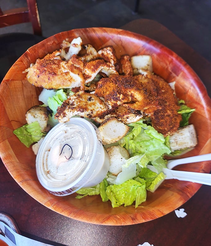 The chicken Caesar salad offers a brief moment of virtue before you inevitably order another round of cheesesteaks. Balance, friends.