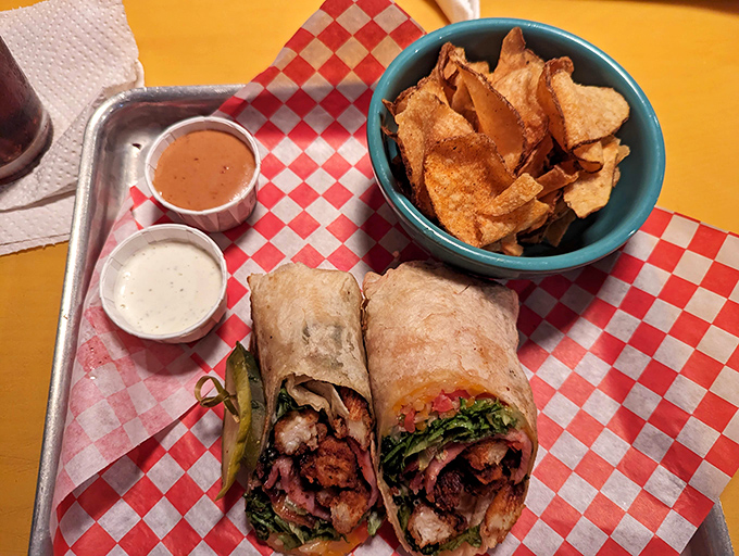 Hearty wraps and house-made kettle chips showcase Big Billy's commitment to quality beyond their legendary burgers.