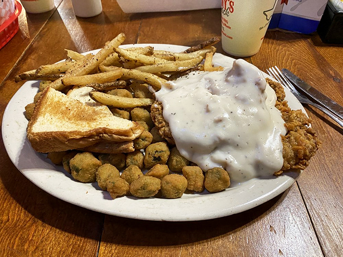 Country-fried steak smothered in gravy that your cardiologist wouldn't approve of, but your soul absolutely requires.