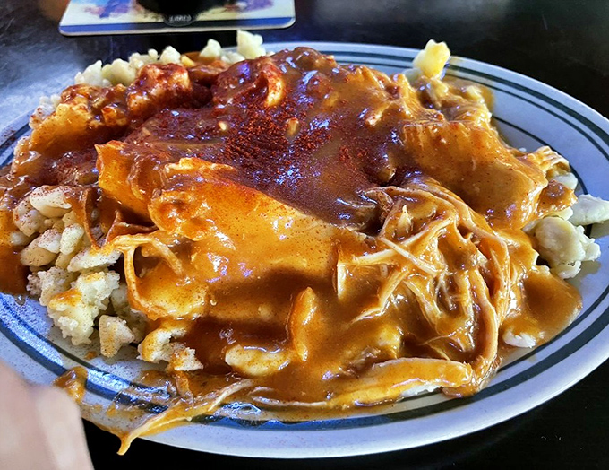 Chicken paprikas: where paprika-infused sauce meets pillowy dumplings. This plate of comfort could make even the worst day better.