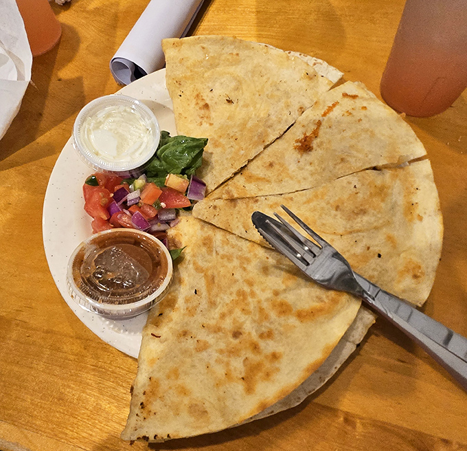 Quesadillas done right—crispy, cheesy, and served with the kind of fresh pico de gallo that makes you forget you're in Ohio, not Oaxaca.