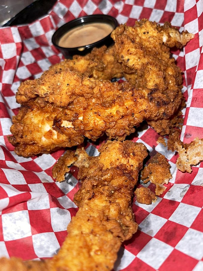 Not your cafeteria chicken tenders. These golden-brown beauties are what happens when fried chicken gets a PhD in crispiness.