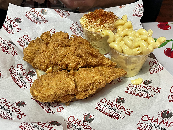 Fried chicken tenders with mac and cheese&mdash;proof that sometimes the simplest combinations are culinary masterpieces. Comfort food that hugs your soul.