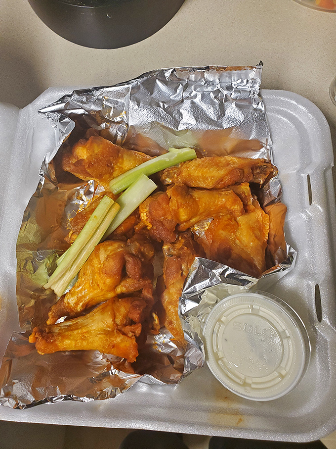 Buffalo wings that demand respect and multiple napkins &ndash; crispy, saucy perfection that makes you understand why people drive across state lines.