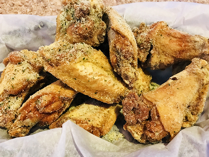 These dry-rubbed wings aren't just fried, they're transformed. The kind of finger food that makes you forget napkins exist until it's too late.