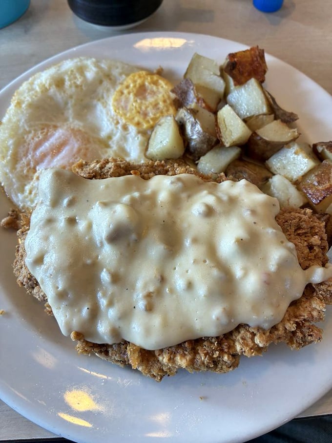 Chicken fried steak with gravy so good you'll want to write poetry about it—if your mouth wasn't already busy with more important tasks.
