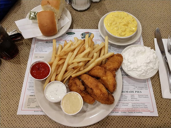 Golden chicken tenders with mac and cheese&mdash;proof that sometimes the simplest combinations bring the greatest joy.