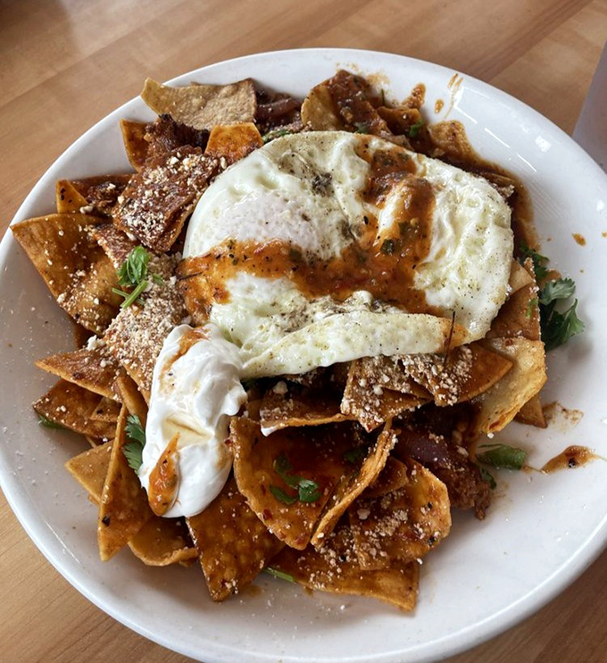 Chilaquiles that strike the perfect balance between crispy and saucy. Those eggs on top are the breakfast equivalent of a cherry on a sundae.