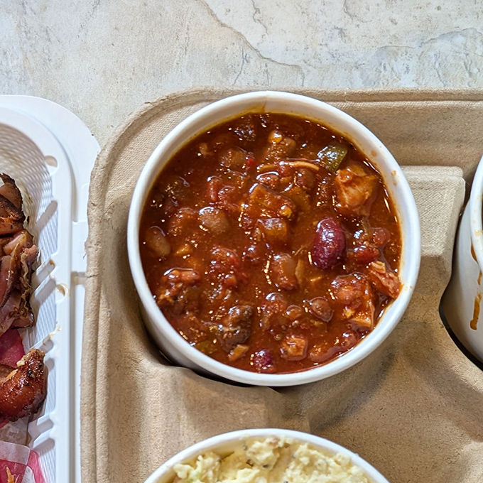 Bean lovers, rejoice! This isn't just a side dish &ndash; it's a supporting actor worthy of its own award, studded with bits of smoky meat.