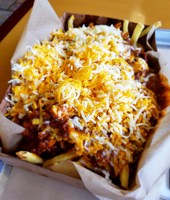 Chili cheese fries that require both fork and commitment. That golden cheese blanket isn't just topping&mdash;it's a warm hug for your taste buds.