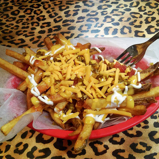 Loaded fries that require both a fork and a commitment. These golden beauties topped with chili, cheese, and more are the supporting act that steals the show.