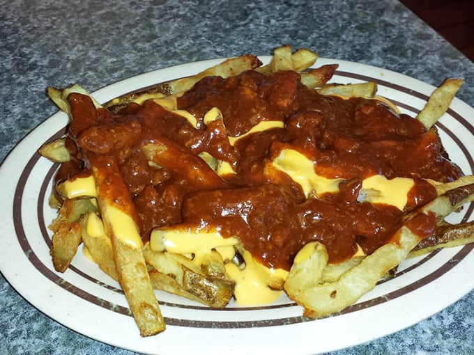 6. chili cheese friesChili cheese fries that require both a fork and a commitment. The kind of indulgence that makes you temporarily forget words like "cholesterol."