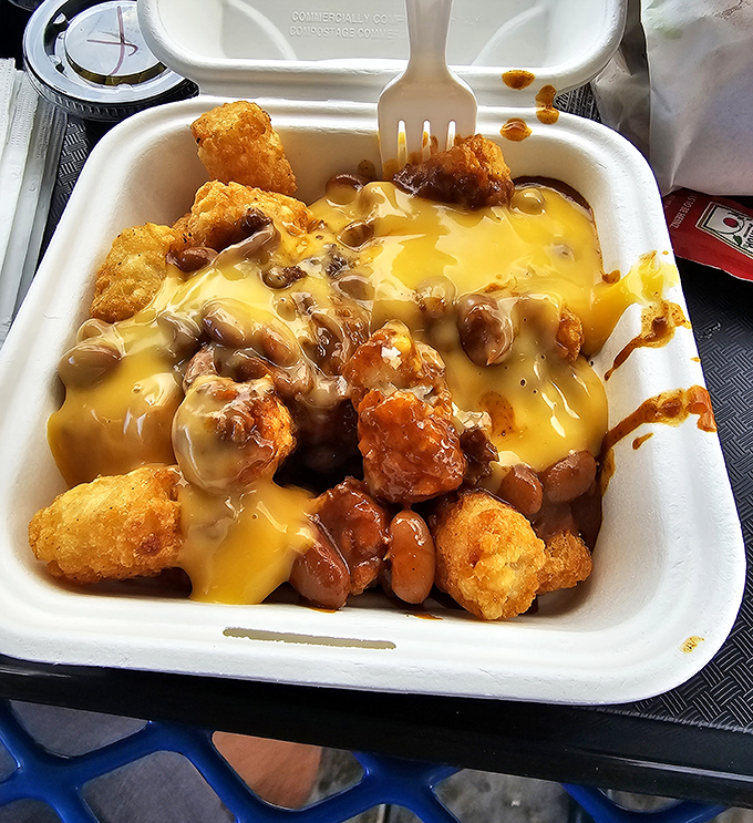 Tater tots elevated to their highest calling &ndash; smothered in chili, cheese, and onions. Comfort food that doesn't need a therapist's couch, just your undivided attention.
