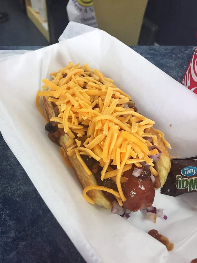 The perfect chili dog doesn't exi&mdash;wait, I stand corrected. Behold this masterpiece topped with melted cheese and a mountain of savory goodness.