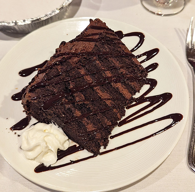 This chocolate cake isn't just dessert, it's a declaration of love &ndash; with chocolate drizzle calligraphy spelling out "more please."