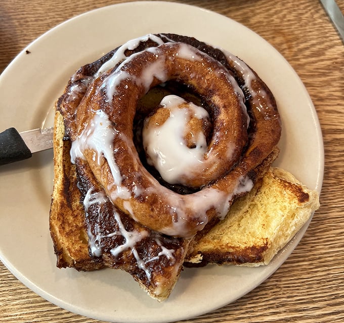 The cinnamon roll that launched a thousand road trips. Glazed, gooey, and gloriously oversized&mdash;it's breakfast dessert at its finest.