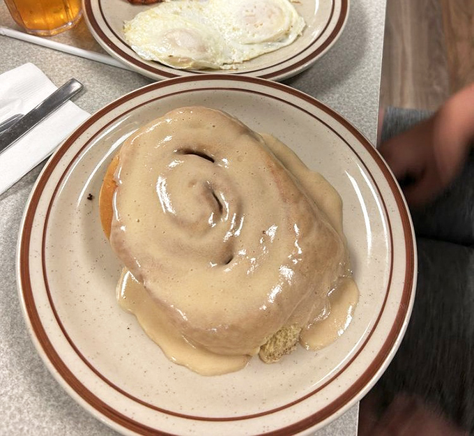 The cinnamon roll isn't just a pastry here&mdash;it's an event. Warm, swirled perfection drowning in icing that melts into every crevice.