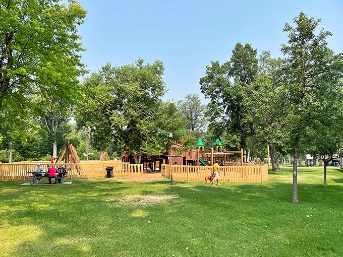 City Park's wooden playground fortress&mdash;where kids become knights and pirates while parents enjoy the shade of century-old trees.