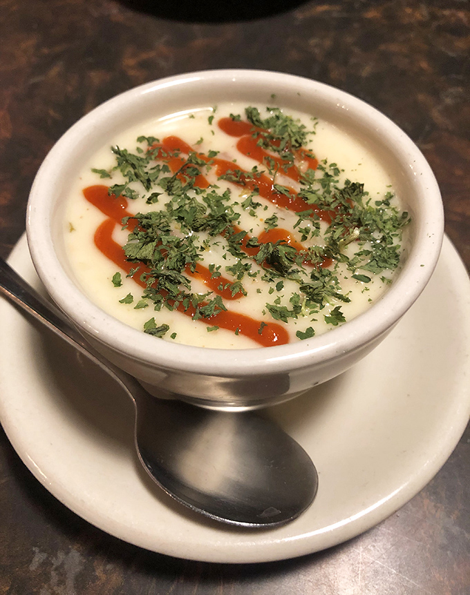 A bowl of comfort that whispers sweet nothings to your soul while herbs and hot sauce add the exclamation points.