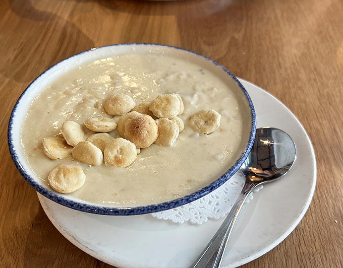Creamy New England clam chowder topped with oyster crackers, because some traditions exist for extremely good reasons involving your mouth. 