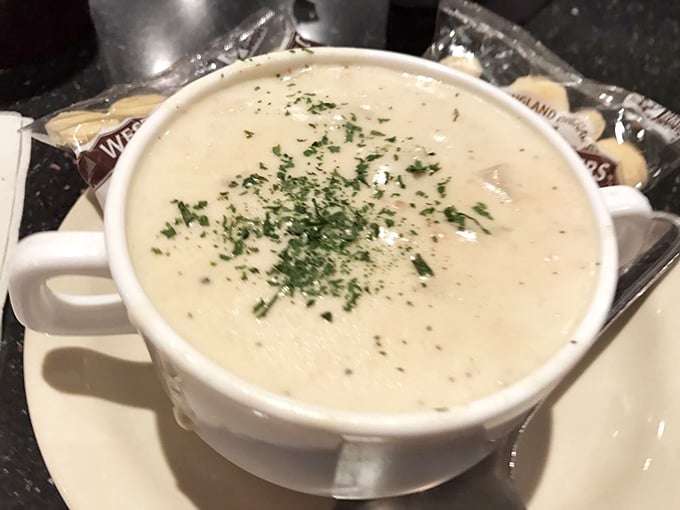 Clam chowder so creamy it could make a New Englander weep with joy. That sprinkle of herbs? The chef showing off.