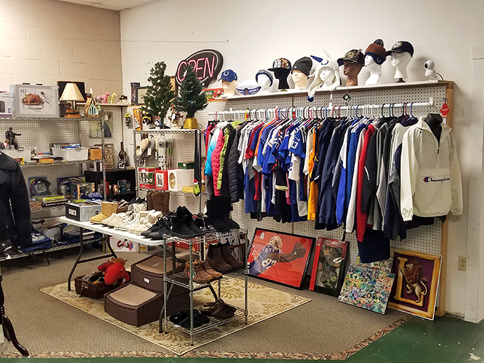 A sartorial time machine where vintage sports jerseys hang alongside quirky hats. Even mannequin heads seem to be enjoying their second act in this clothing corner.