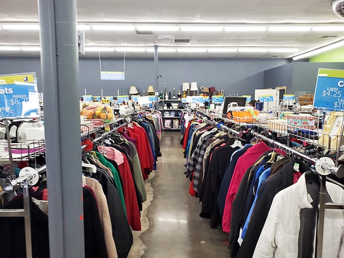 The men's department stands like a regimented army of potential, where hidden designer labels wait for the patient explorer.