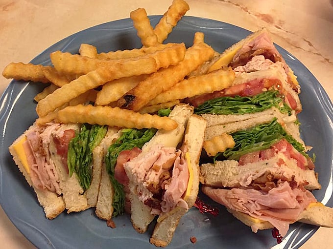 The club sandwich&mdash;architecture you can eat. Those perfectly stacked layers deserve their own blueprint and possibly a building permit.