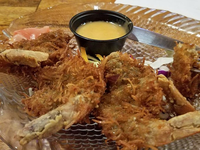 Coconut shrimp so perfectly golden, they could teach other appetizers a thing or two about presentation.