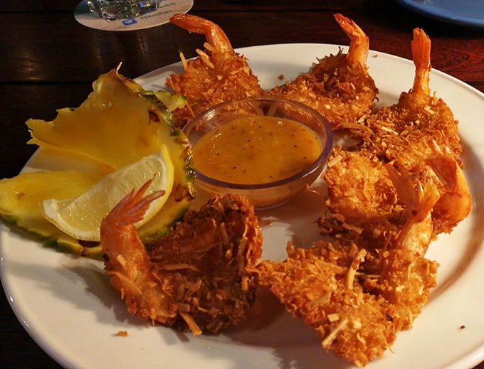 Coconut shrimp so perfectly golden, they look like they've been sunbathing on a private beach while the rest of us were stuck in traffic.