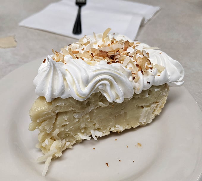 Coconut cream pie topped with enough whipped cream and toasted coconut to make dessert-for-breakfast seem almost reasonable.