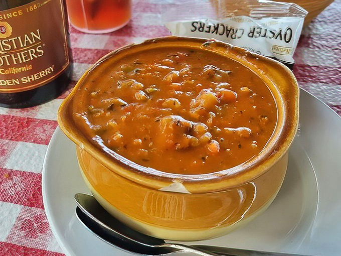 A bowl of conch chowder that could make a New Englander question their loyalty. Tomato-based with chunks of conch and vegetables &ndash; Florida's answer to clam chowder.