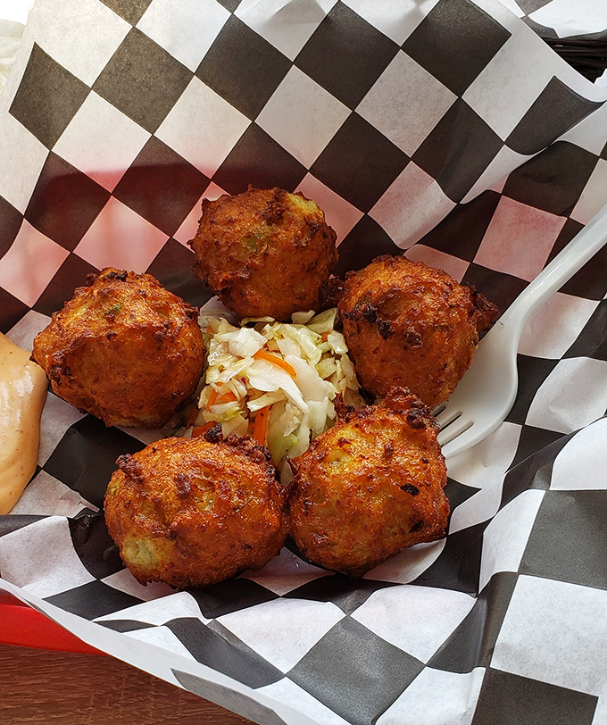 Golden-brown conch fritters that crunch like your favorite vinyl record. These little flavor bombs are the Beatles of appetizers&mdash;timeless and universally loved.