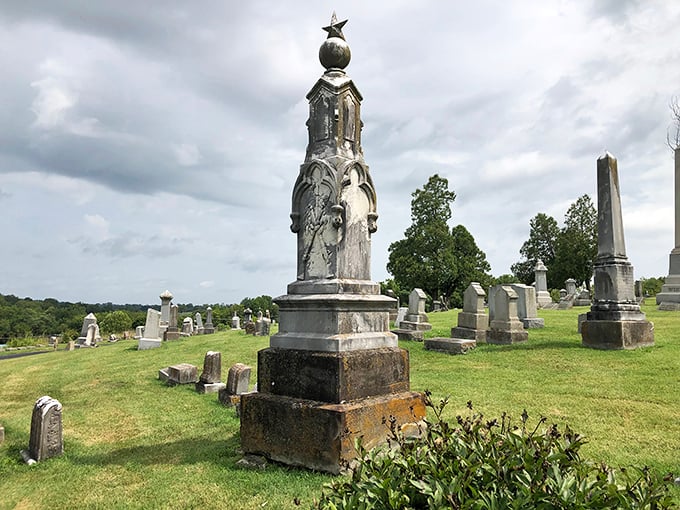 This historic cemetery monument stands as a silent witness to generations past, where the rolling Kentucky hills provide an eternally peaceful resting place.