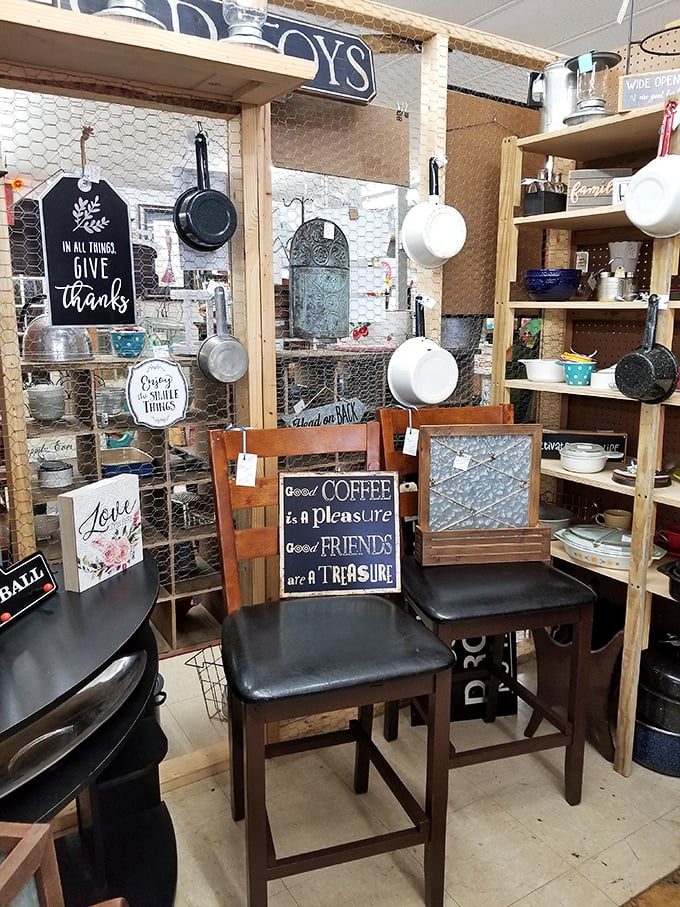 Kitchen nostalgia central! Those hanging cast iron pans have probably cooked more Sunday dinners than all of today's meal delivery services combined.