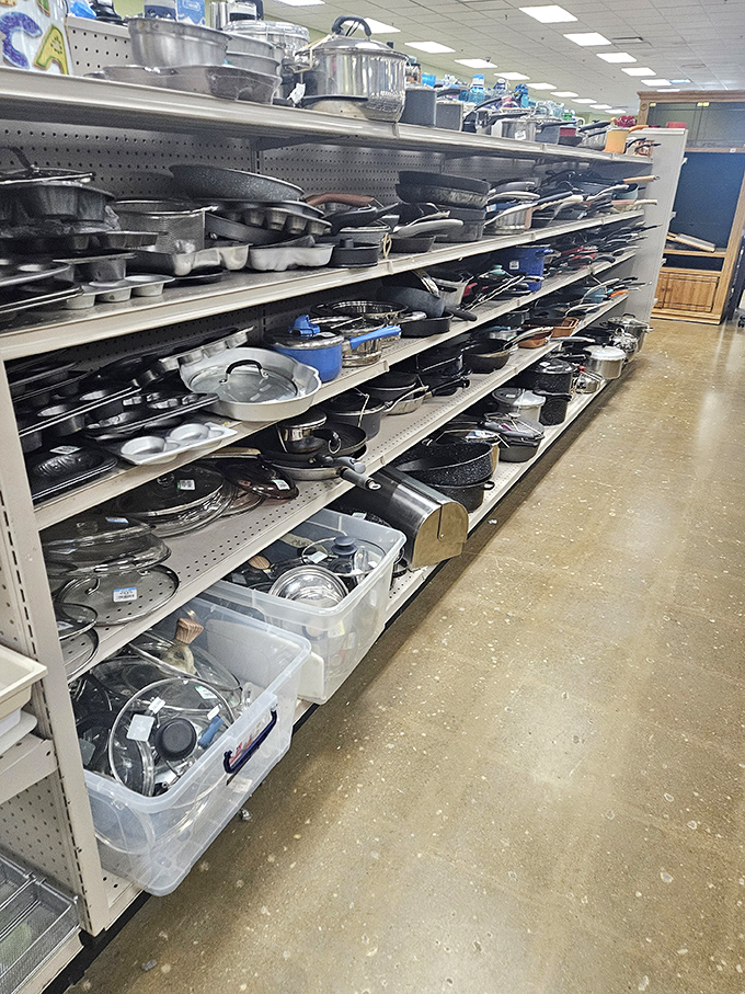 Cast iron paradise! Decades of cooking history line these shelves, each pan whispering tales of family recipes and Maine's hearty home cooking traditions.