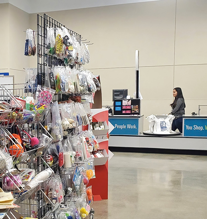 "People Work. You Shop." The checkout counter philosophy that turns your bargain hunting into community support.